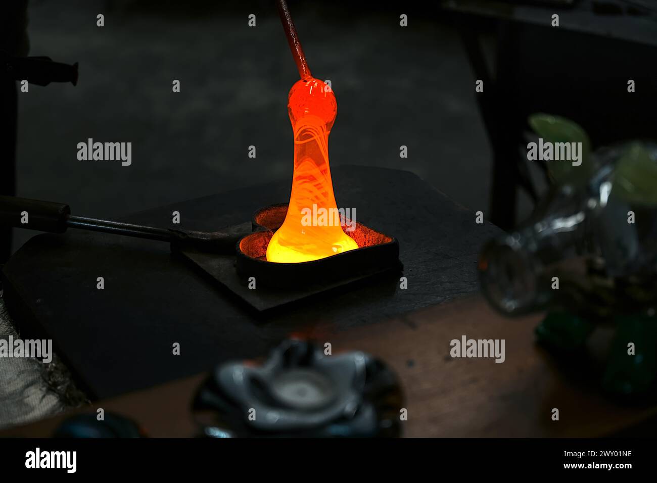 The Art and old craft of glassblowing, hot melted glass Stock Photo - Alamy