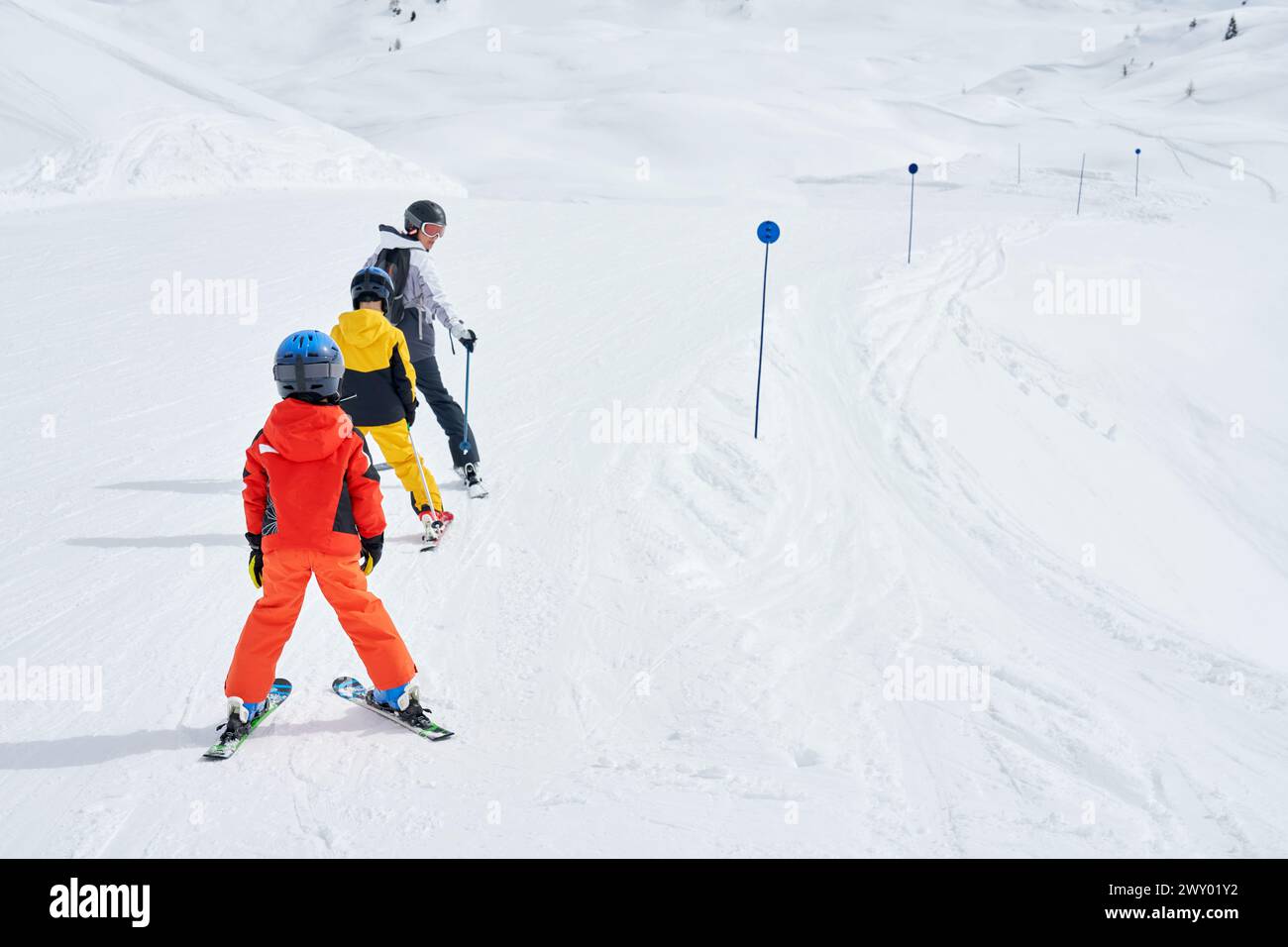Picture of mother teach skiing her kids in Madonna di Campiglio Stock ...