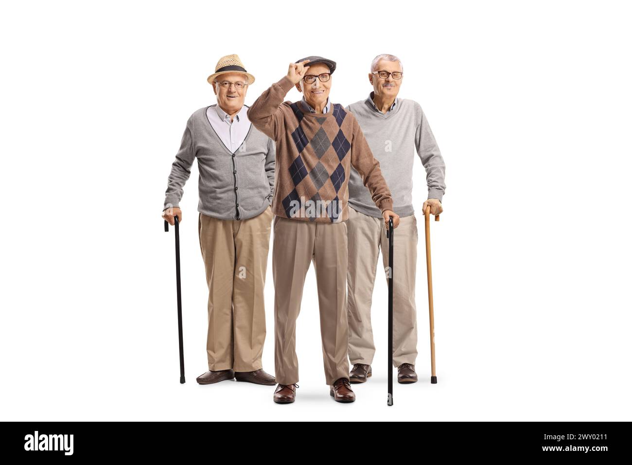 Full length portrait of a group of senior men standing and posing ...