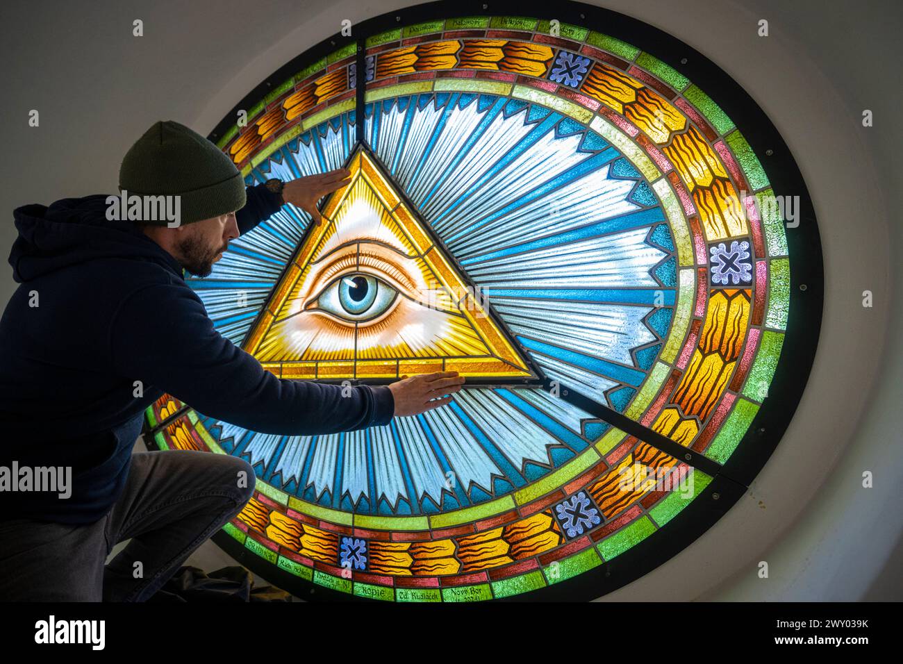 A replica of the stained glass window of the Eye of God has returned to ...