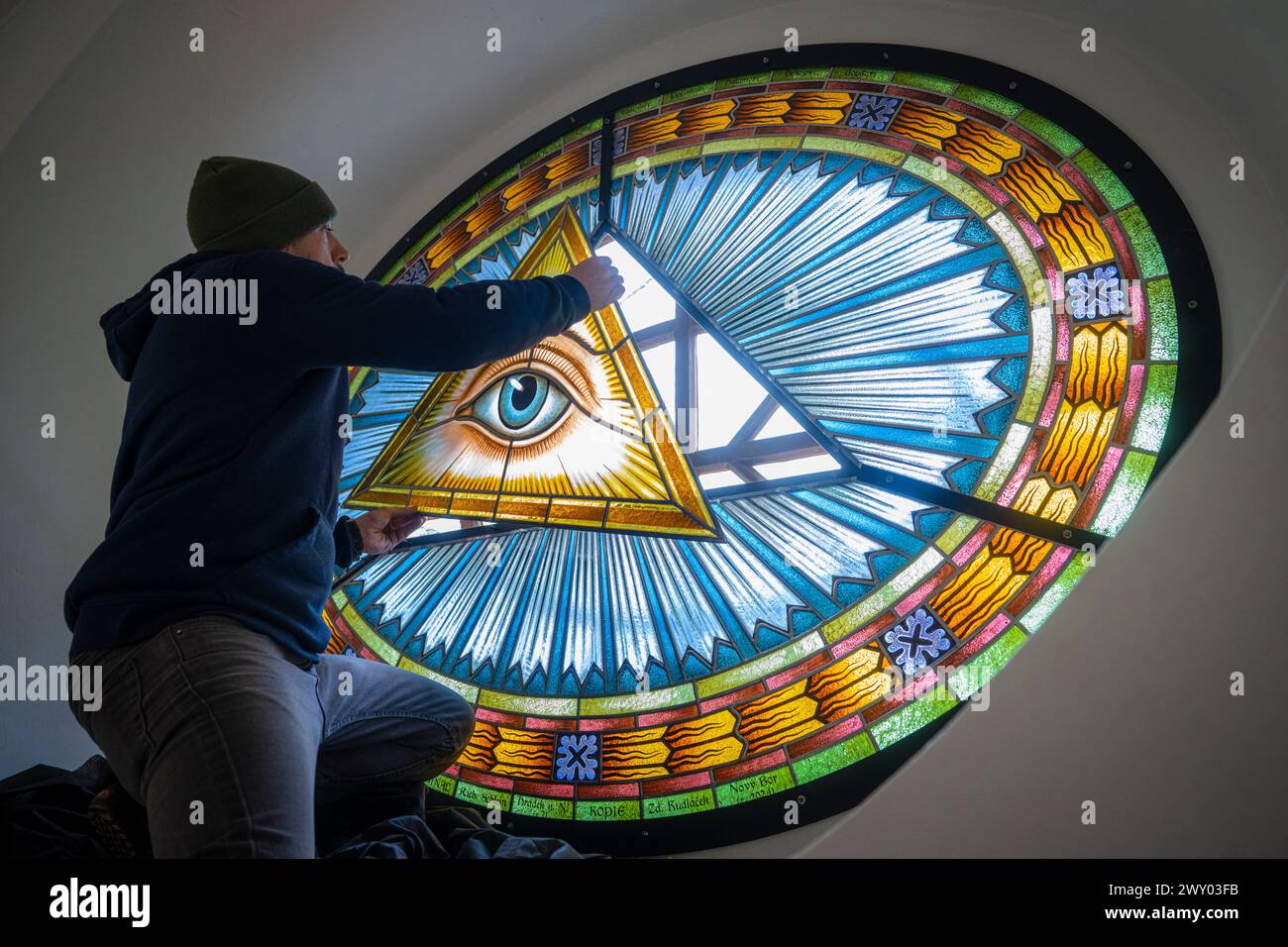 A replica of the stained glass window of the Eye of God has returned to ...