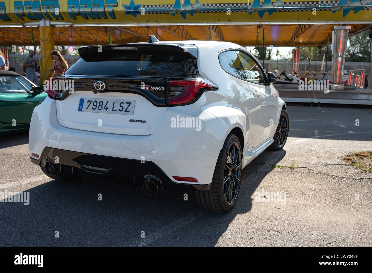 Rear view of a small Japanese light sports car, white Toyota Yaris GR ...
