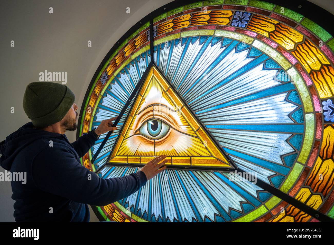 A replica of the stained glass window of the Eye of God has returned to ...