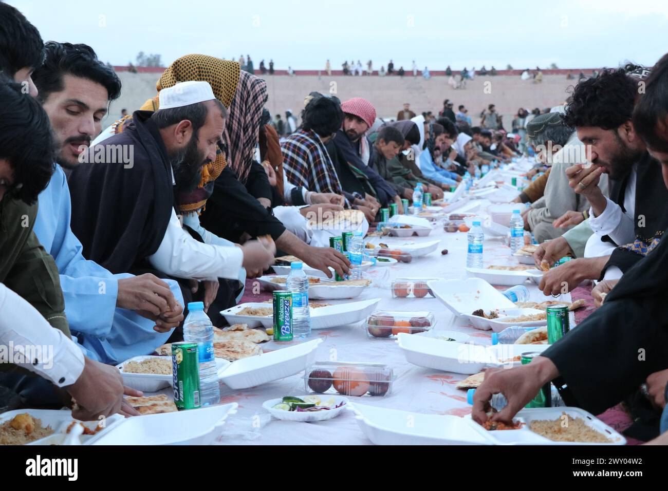 (240403) -- KHOST, April 3, 2024 (Xinhua) -- People break their fast ...