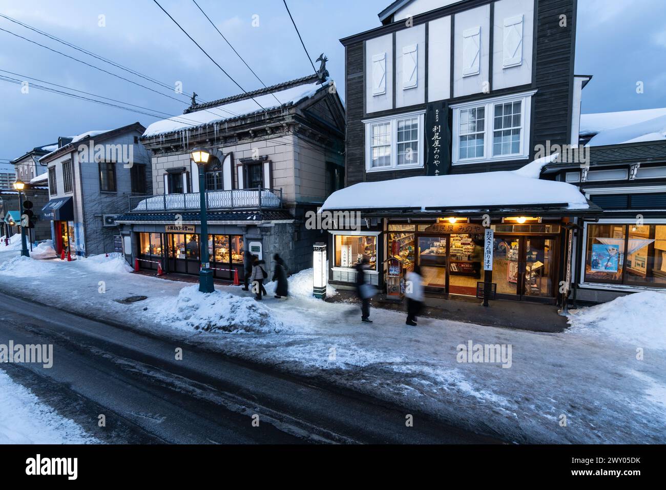 Otaru, Japan - February 09 2024: Tourists and locals walk along ...