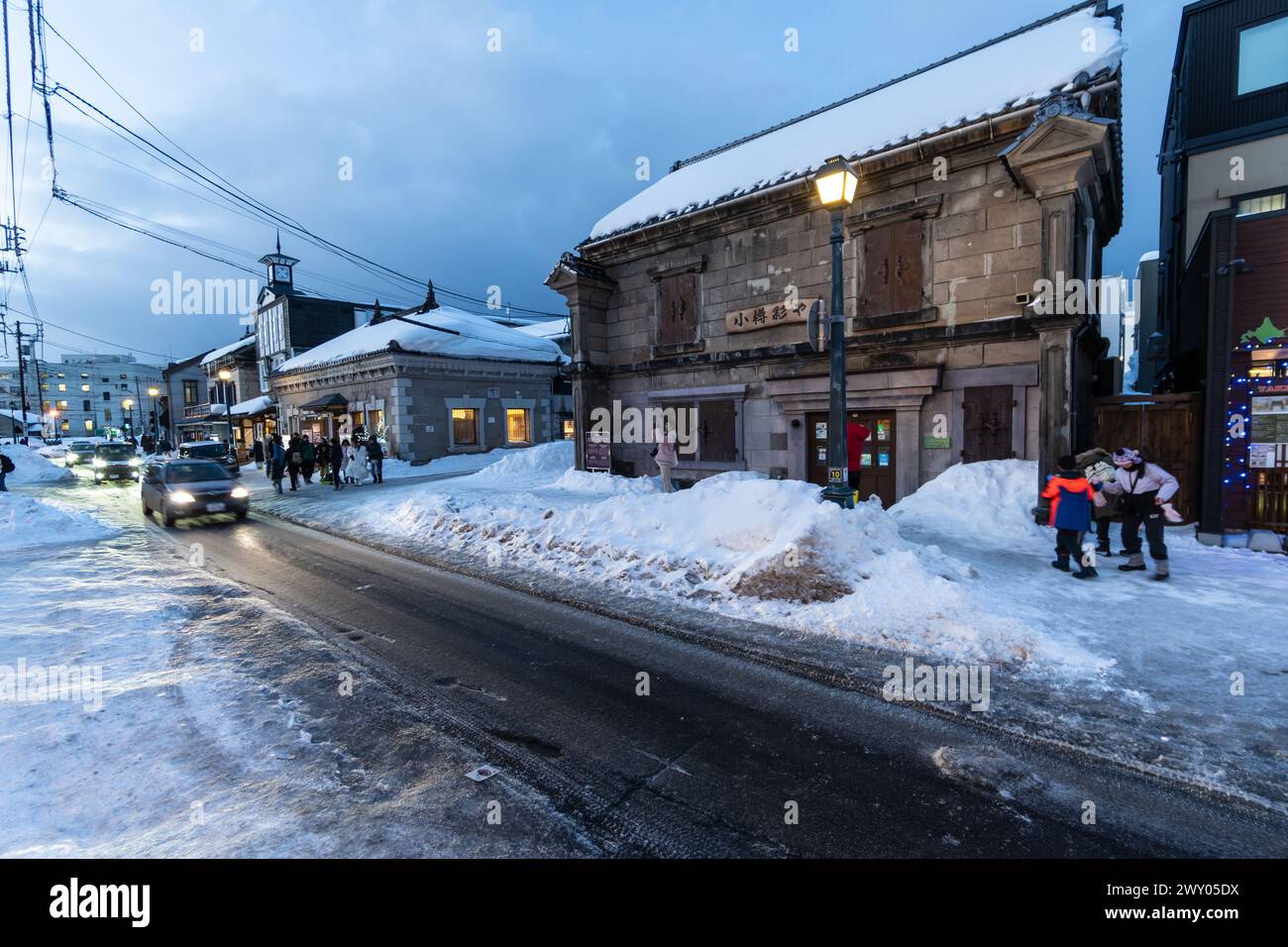 Otaru, Japan - February 09 2024: Tourists and locals walk along ...