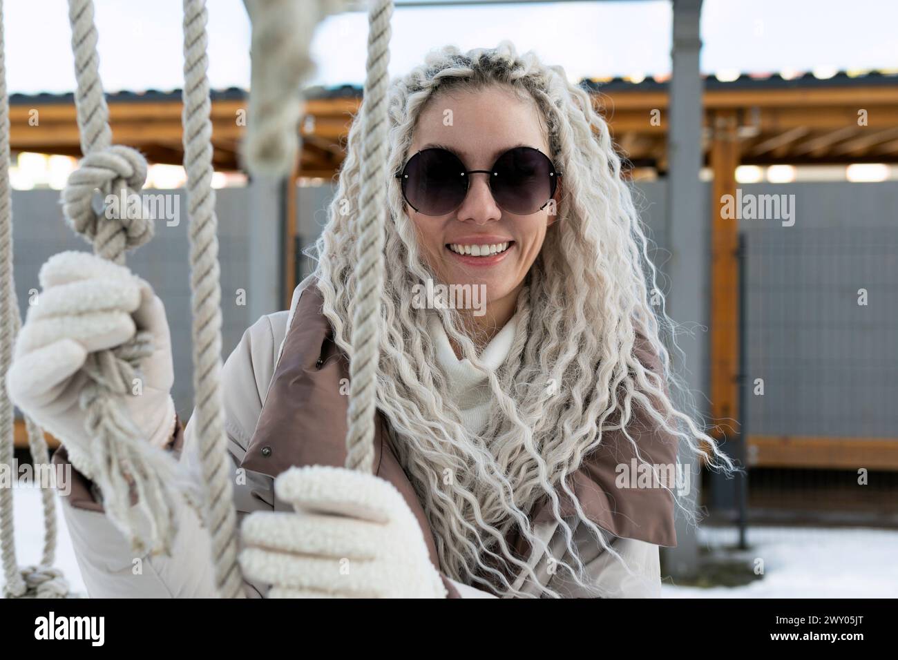 Woman With White Dreadlocks Swinging Stock Photo - Alamy
