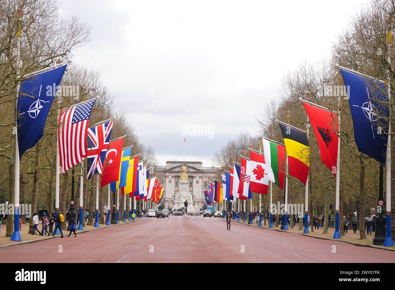 Nato flags hang in front of the national flags of Nato member countries ...