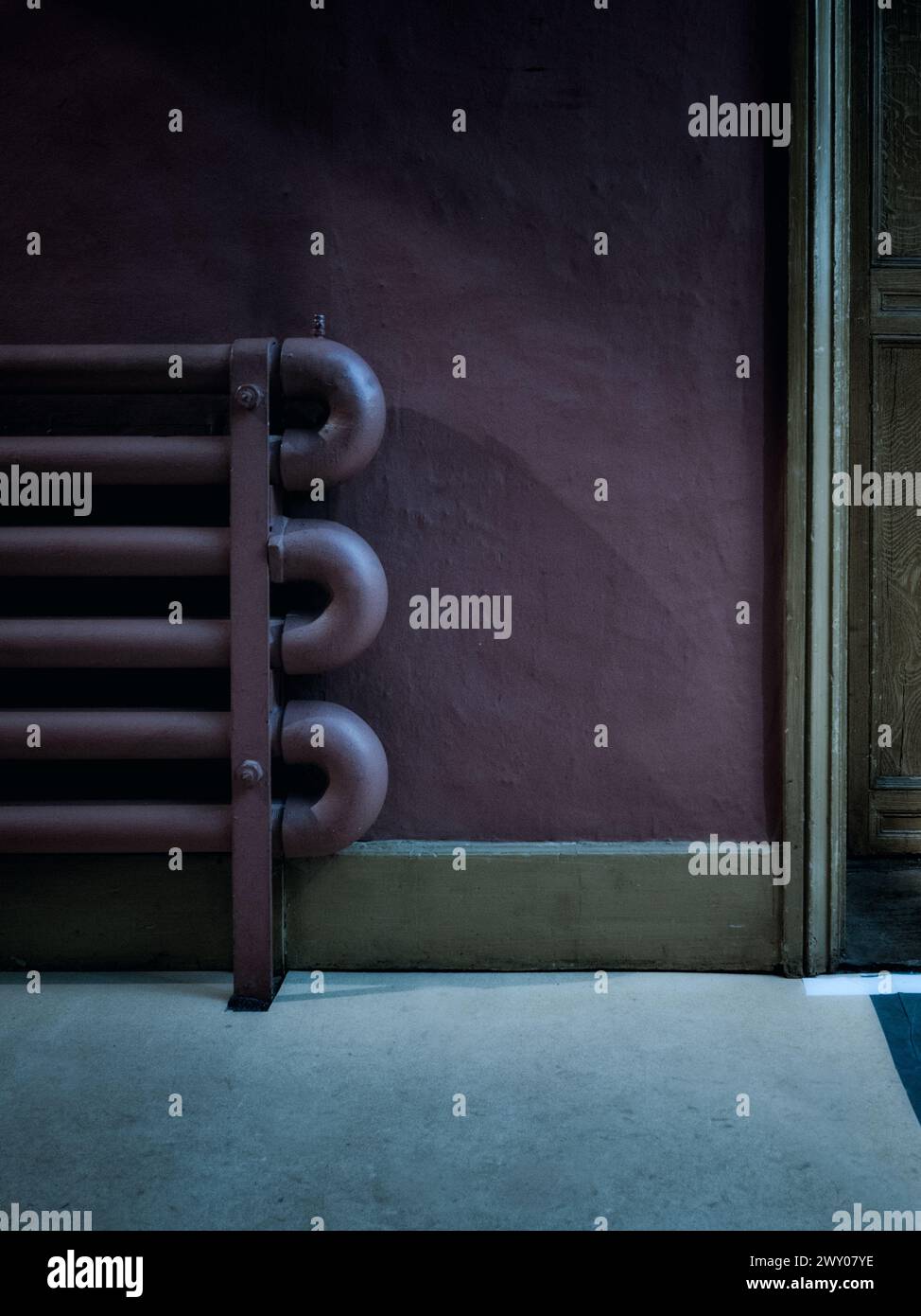 Old fashioned tublular radiator in an English historic house Stock ...