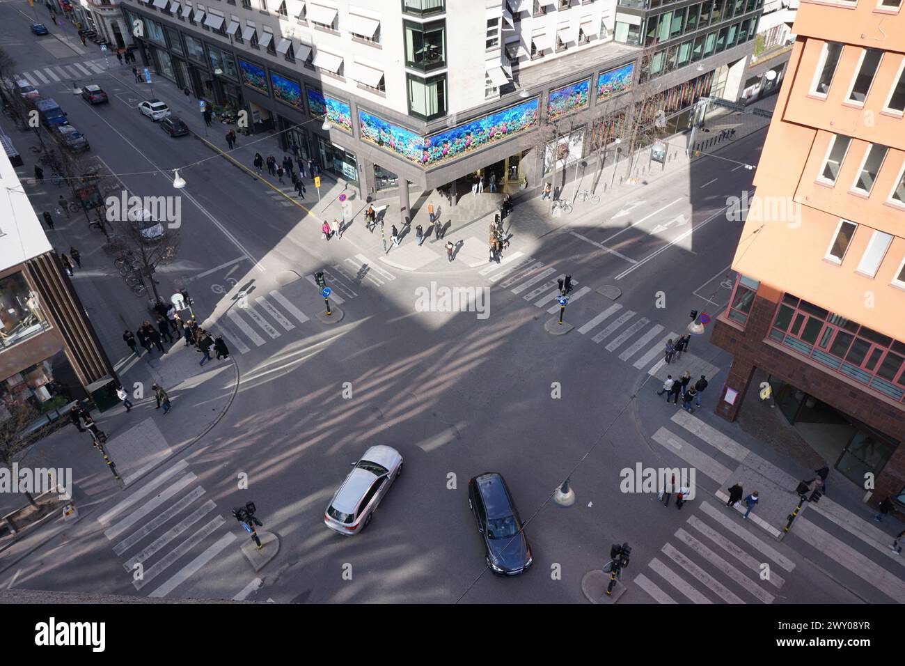 Aerial view of a person crossing the road hi-res stock photography and ...