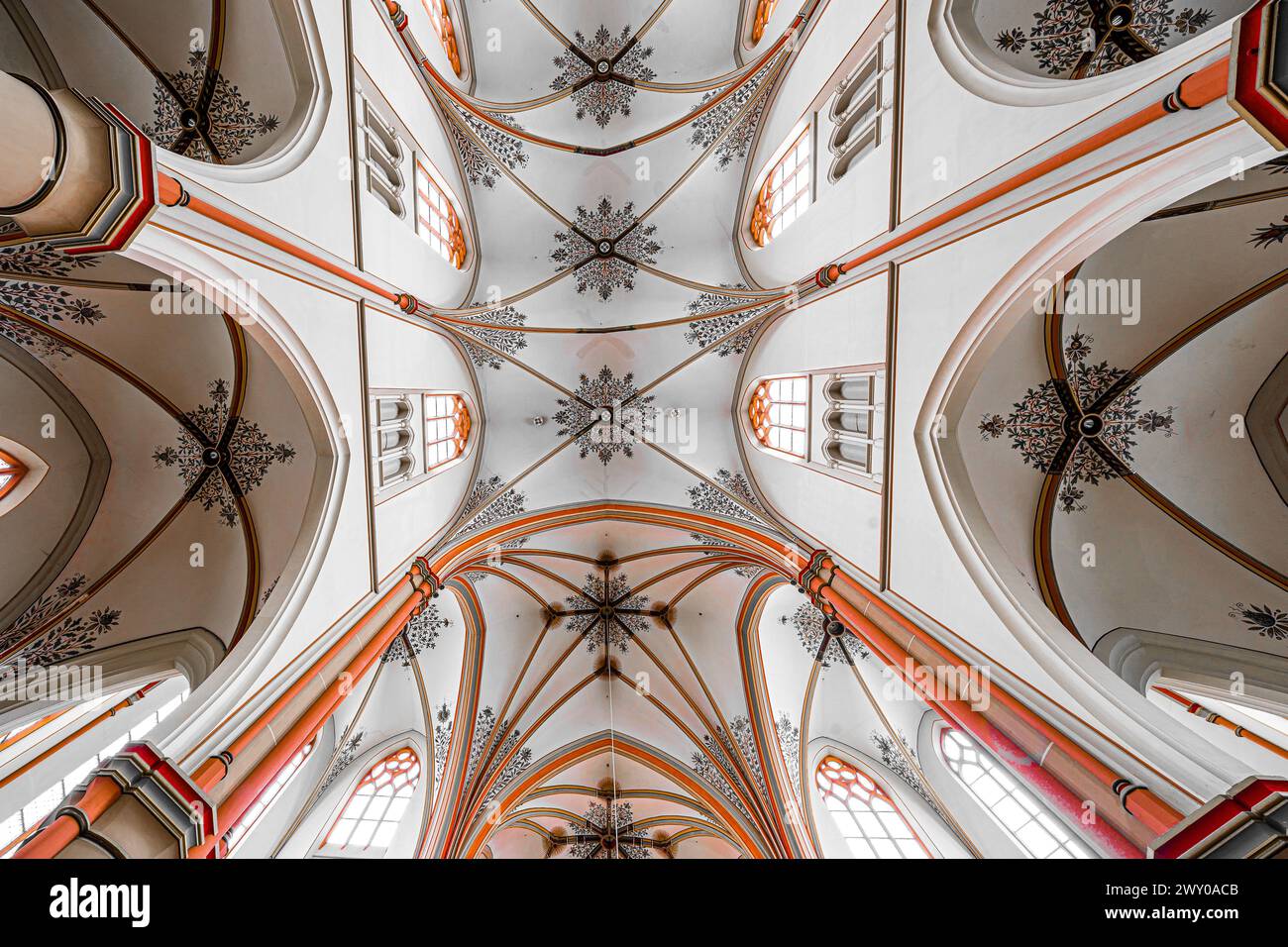 Interior of an old church with wooden benches and an impressively ...
