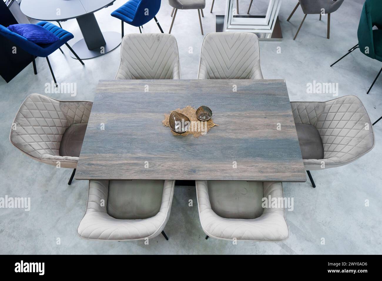 Gray wooden folding table combined with gray chairs with soft fabric ...
