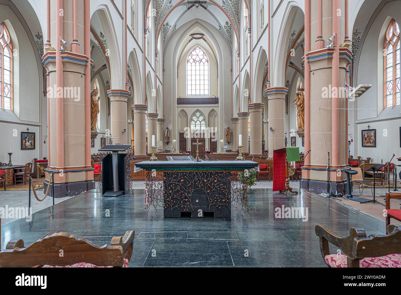 Interior of an old church with wooden benches and an impressively ...