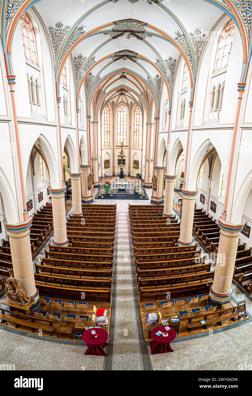 Interior of an old church with wooden benches and an impressively ...