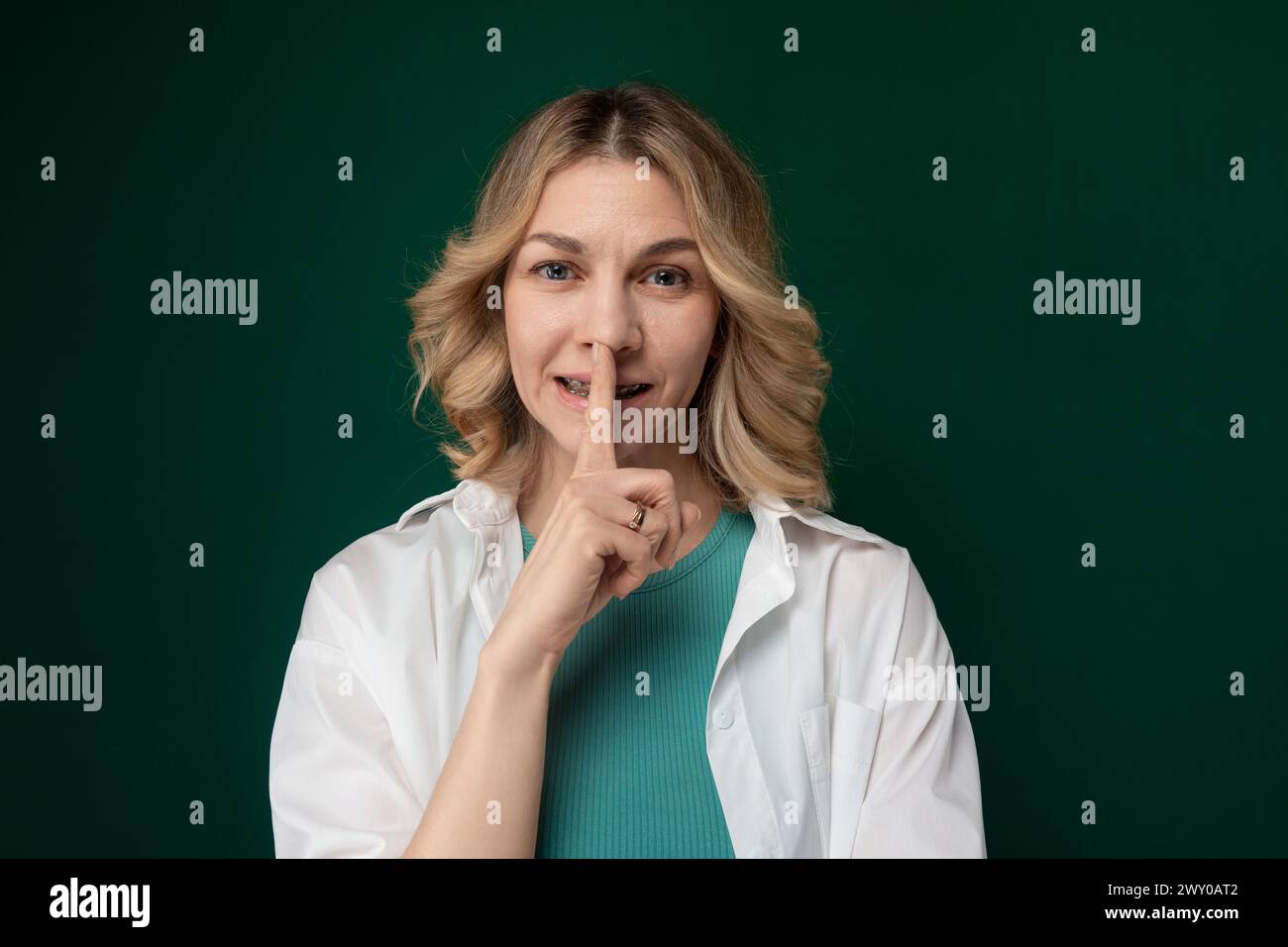 Gesture quietude hi-res stock photography and images - Alamy
