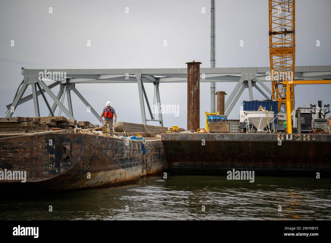 Baltimore, United States. 30th Mar, 2024. A crewmember with the Unified ...