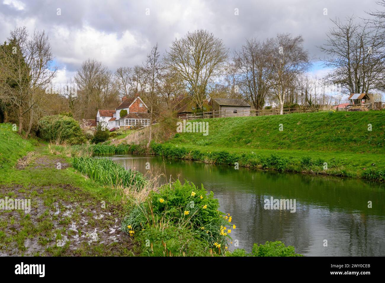 The Mill House in a picturesque setting next to a stream and pond in ...