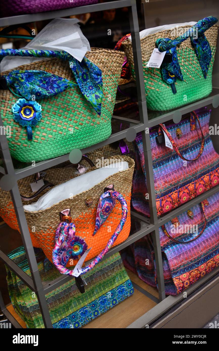 Bags in shop window hi-res stock photography and images - Alamy