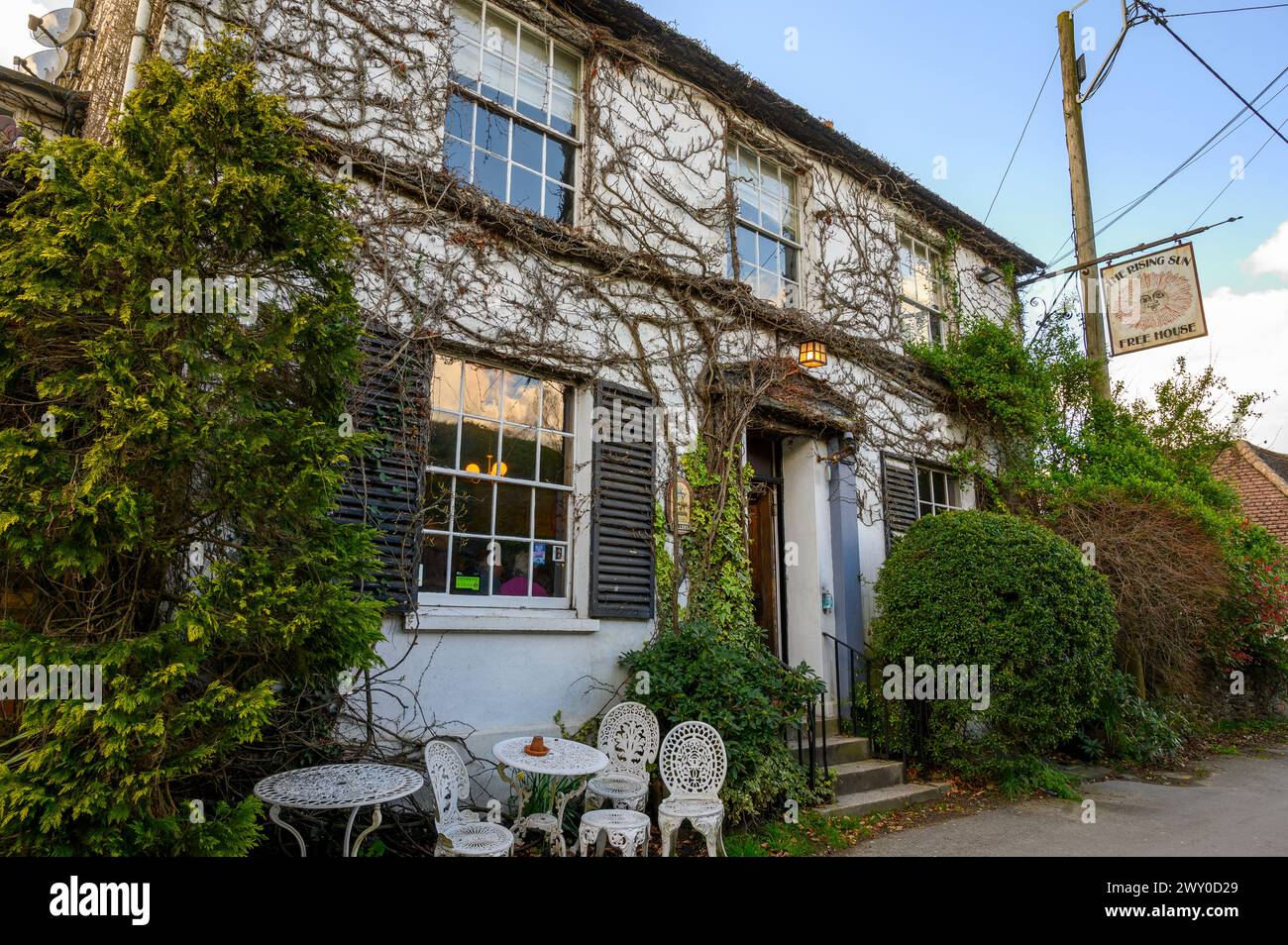 The front facade and sign of The Rising Sun, an old pub in Nutbourne ...