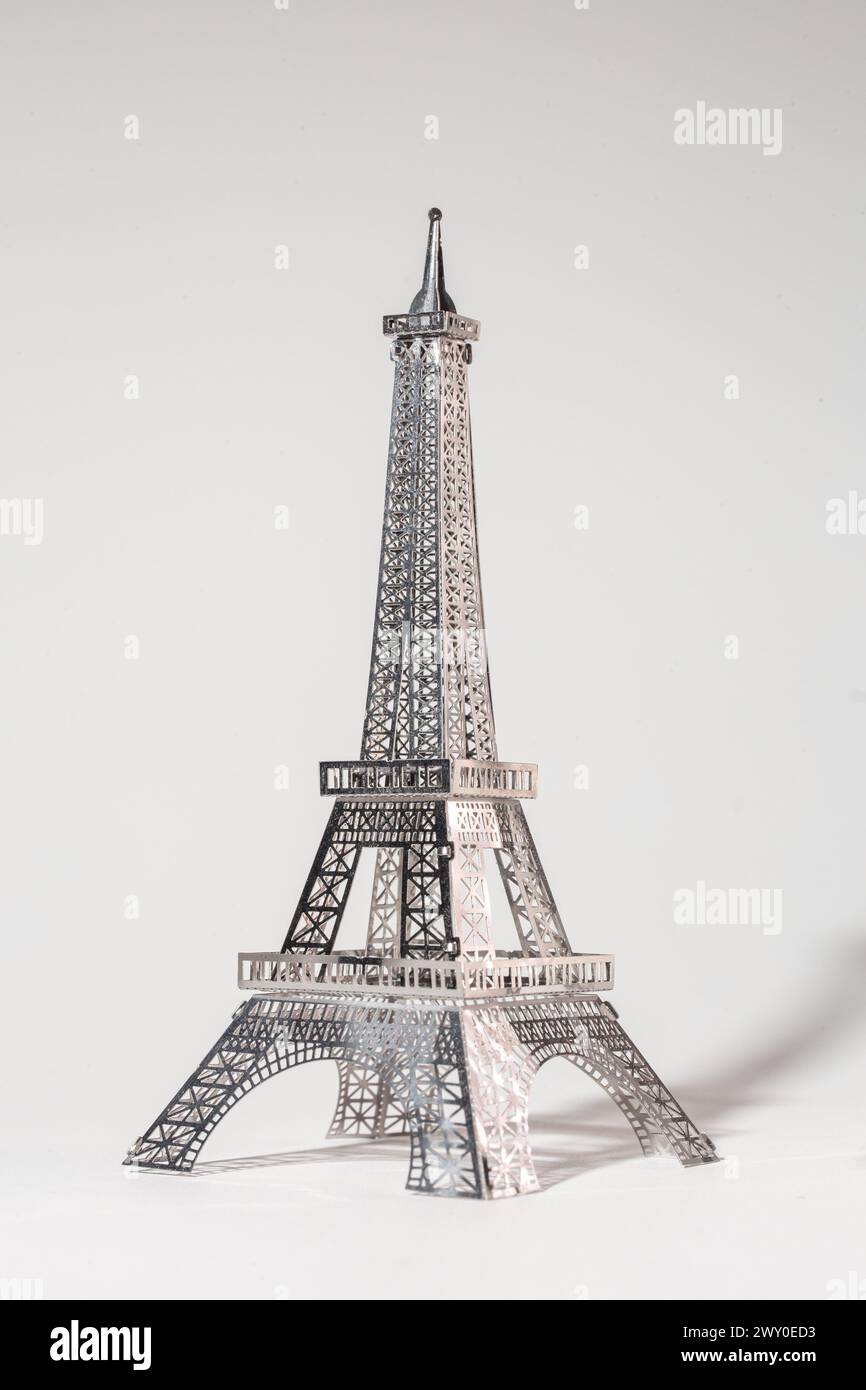 Metal Eiffel Tower Cutout On White Background Lattice Design Highlights Skill And Precision