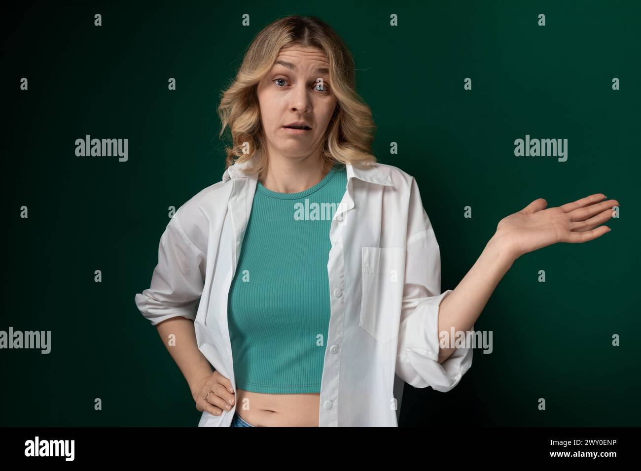 Woman in Green Shirt Holding Hands Out Stock Photo - Alamy