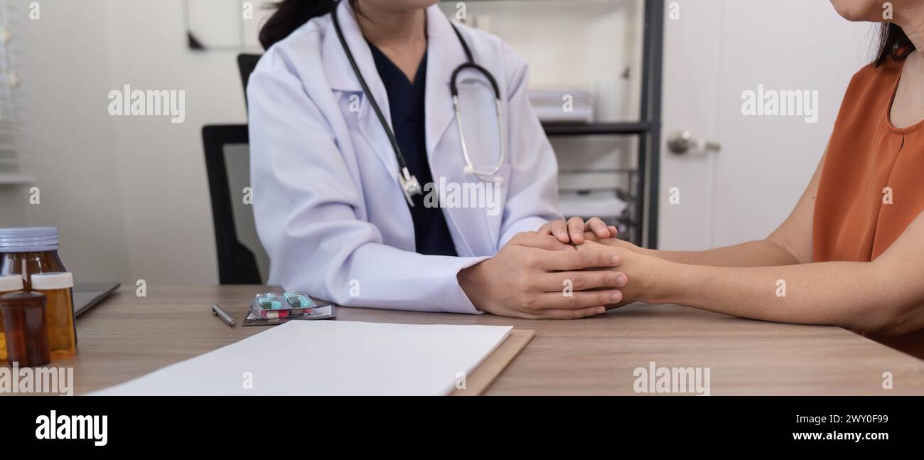 Doctor holding patient hand cheer and encourage while checking your ...