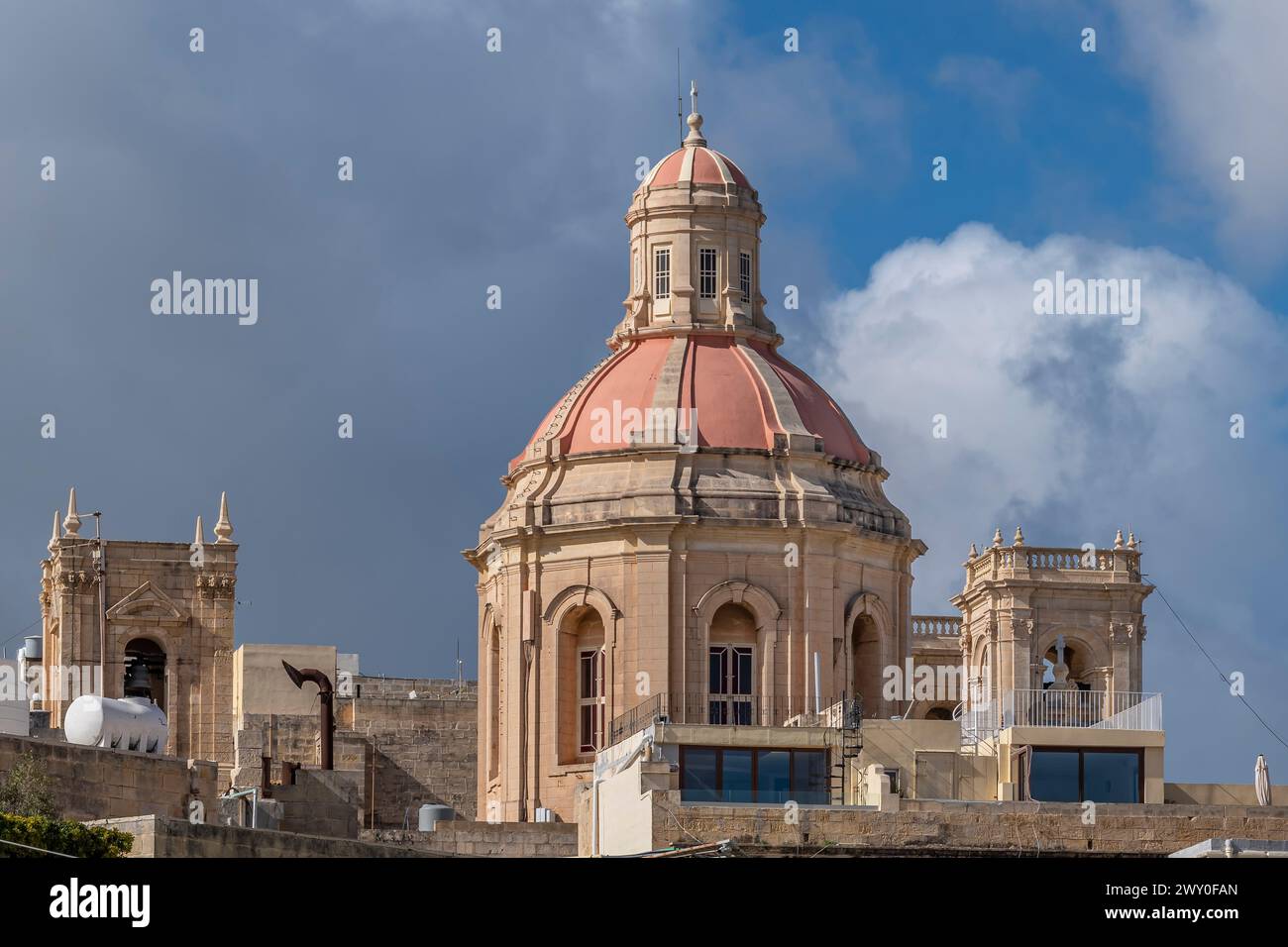 The dome of St. Nicholas Church stands above the rooftops of the ...