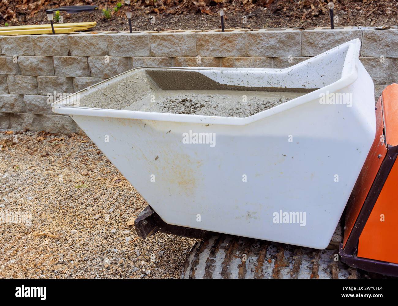 Concrete transportation on construction site using self dumping rubber ...