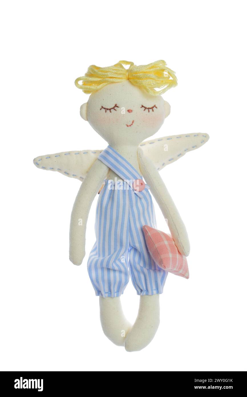 Sleeping blonde boy toy doll isolated on white background Stock Photo ...