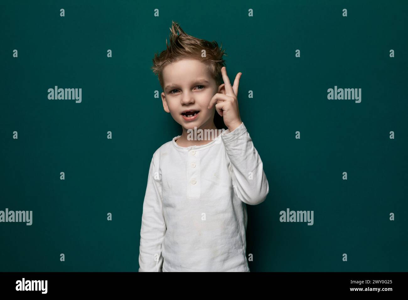 Little Boy Making a Peace Sign Stock Photo - Alamy