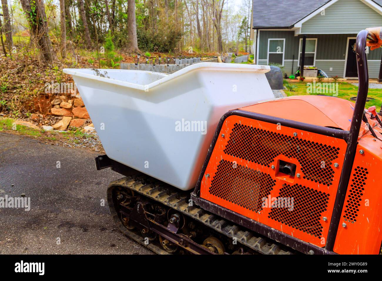 Transporting concrete on construction sites using self dumping rubber ...
