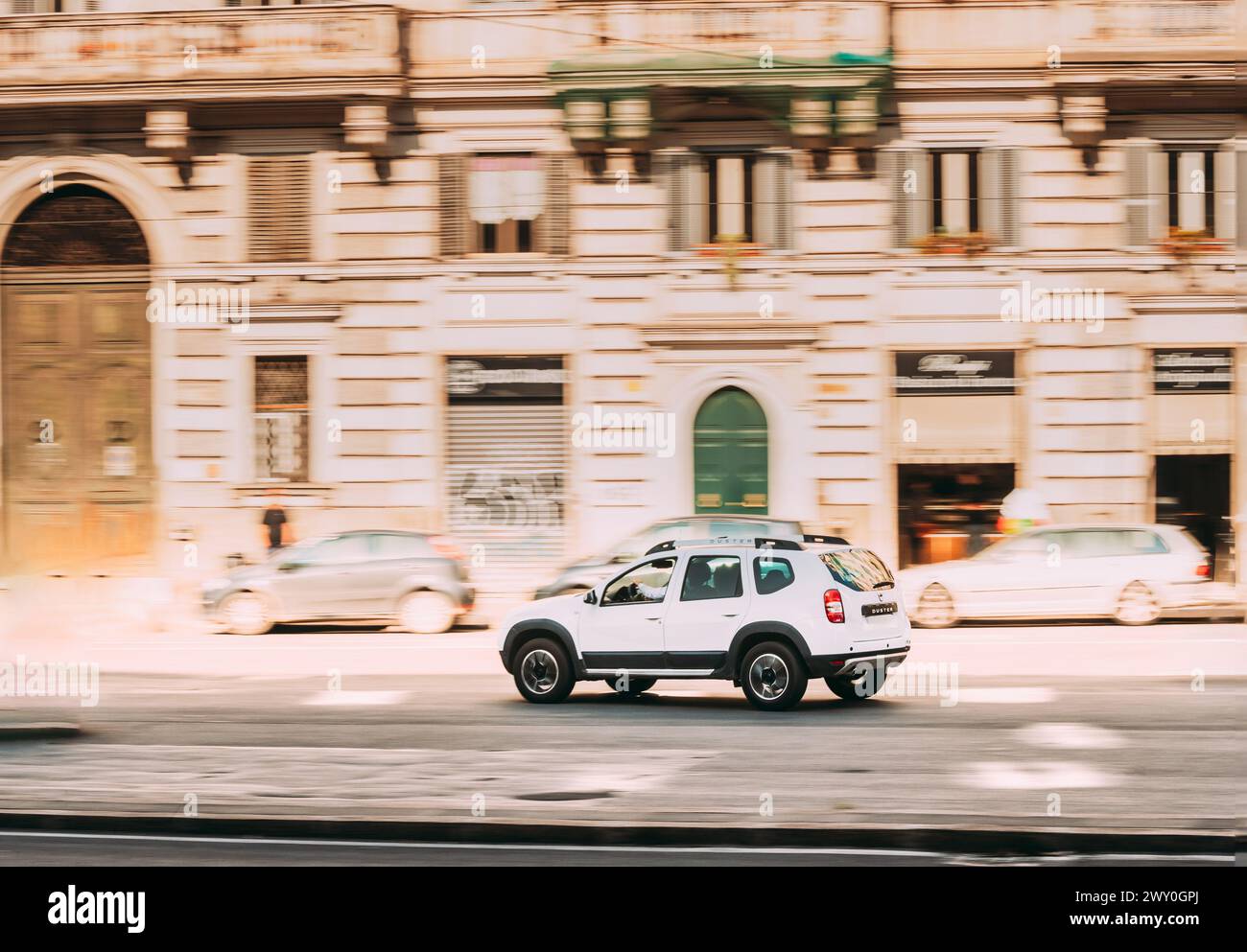 Car Dacia Duster SUV Fast Moving At City Street. Duster produced ...
