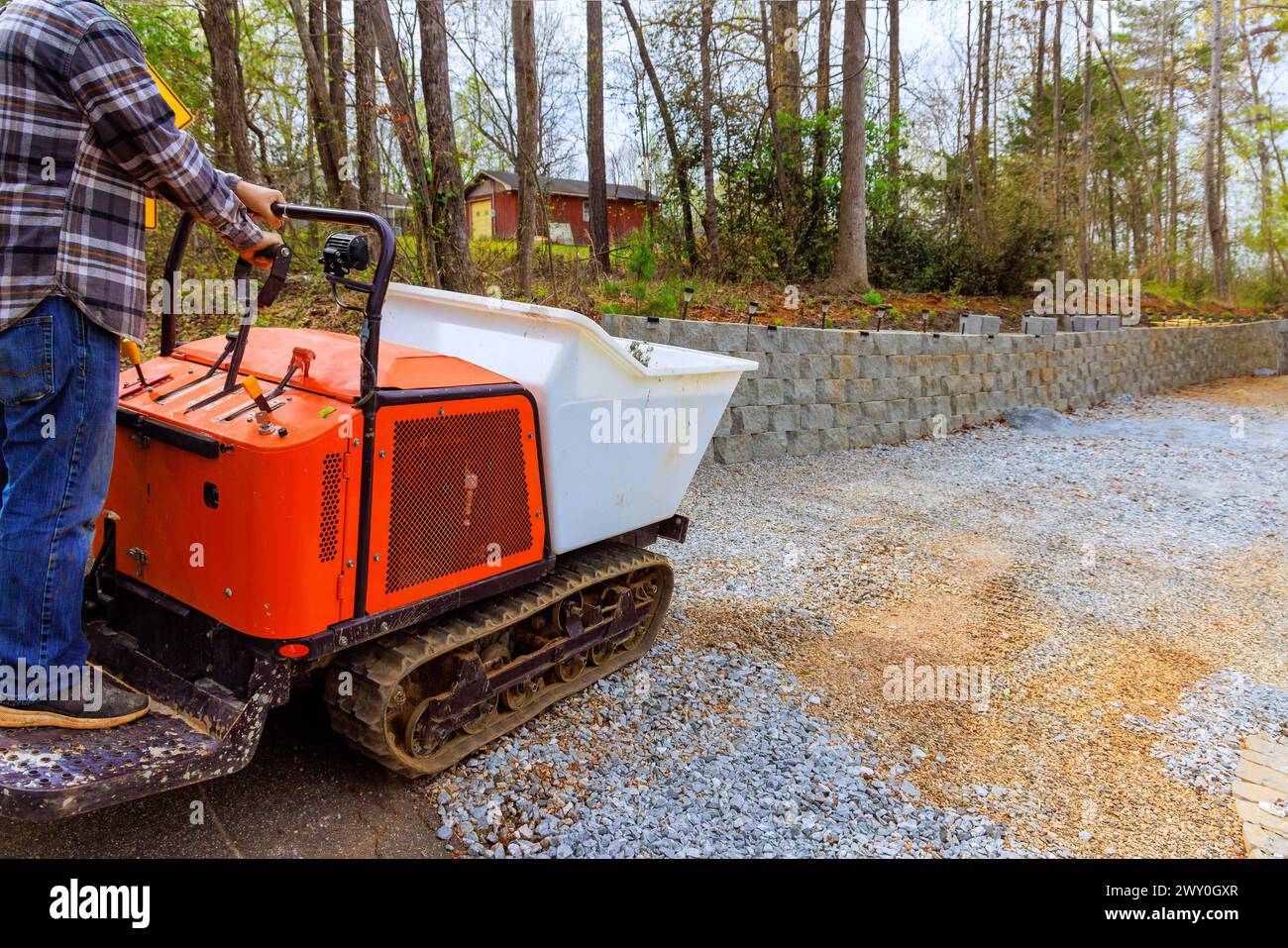 Using self dumping rubber track concrete vehicle to transport concrete ...