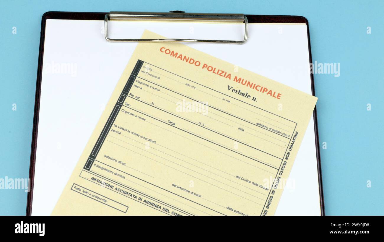 Verbal fine for traffic infringement, paper block and pen on the desk ...