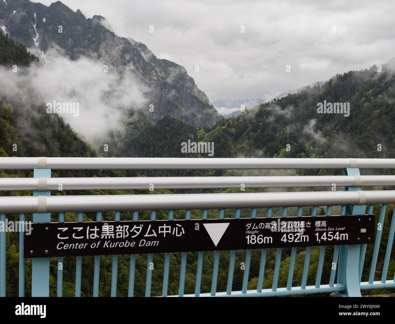 KUROBE DAM, JAPAN - MAY 26 2023: Tourists braving stormy skies and rain ...