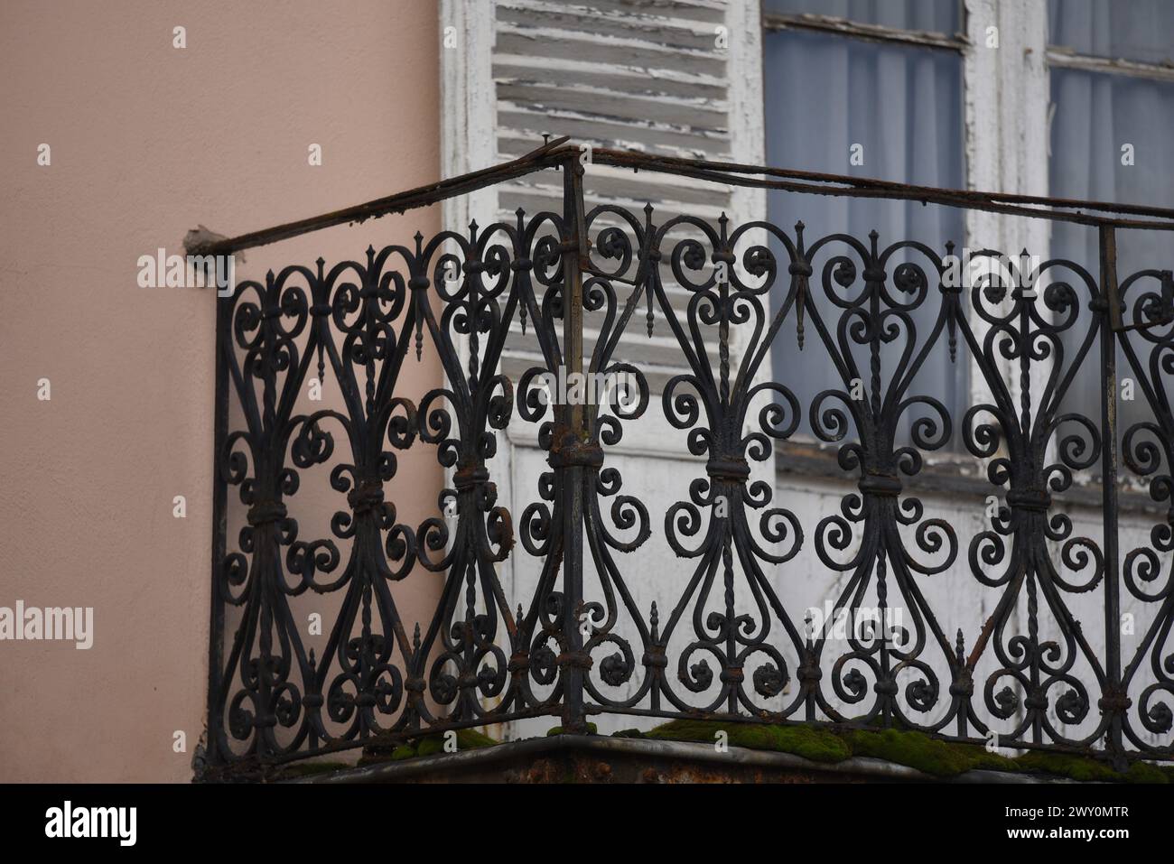 Antique half-timbered house balcony with a handcrafted wrought iron ...