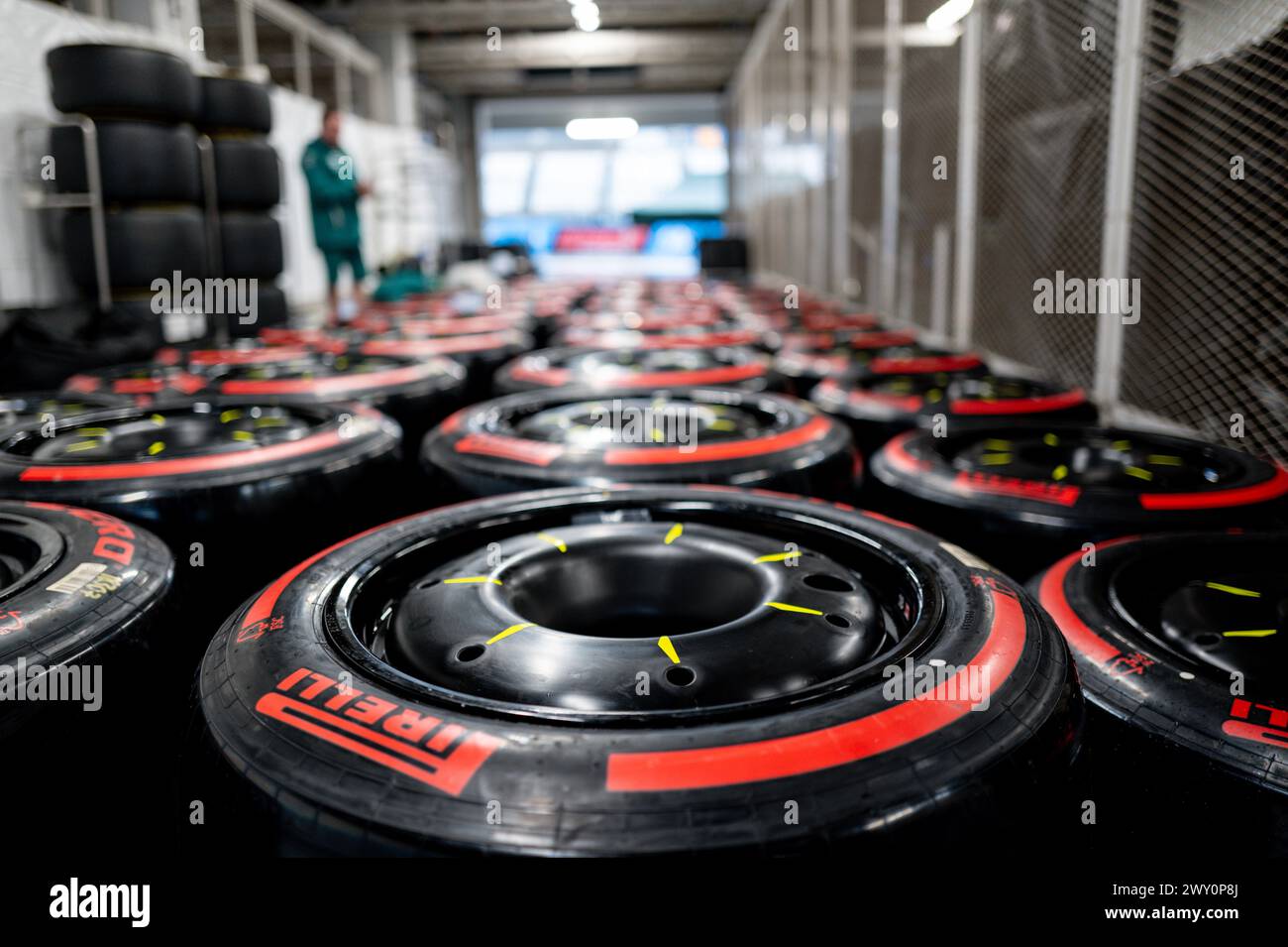 Suzuka Circuit, 3 April 2024: An Aston Martin mechanic setting up tyres ...