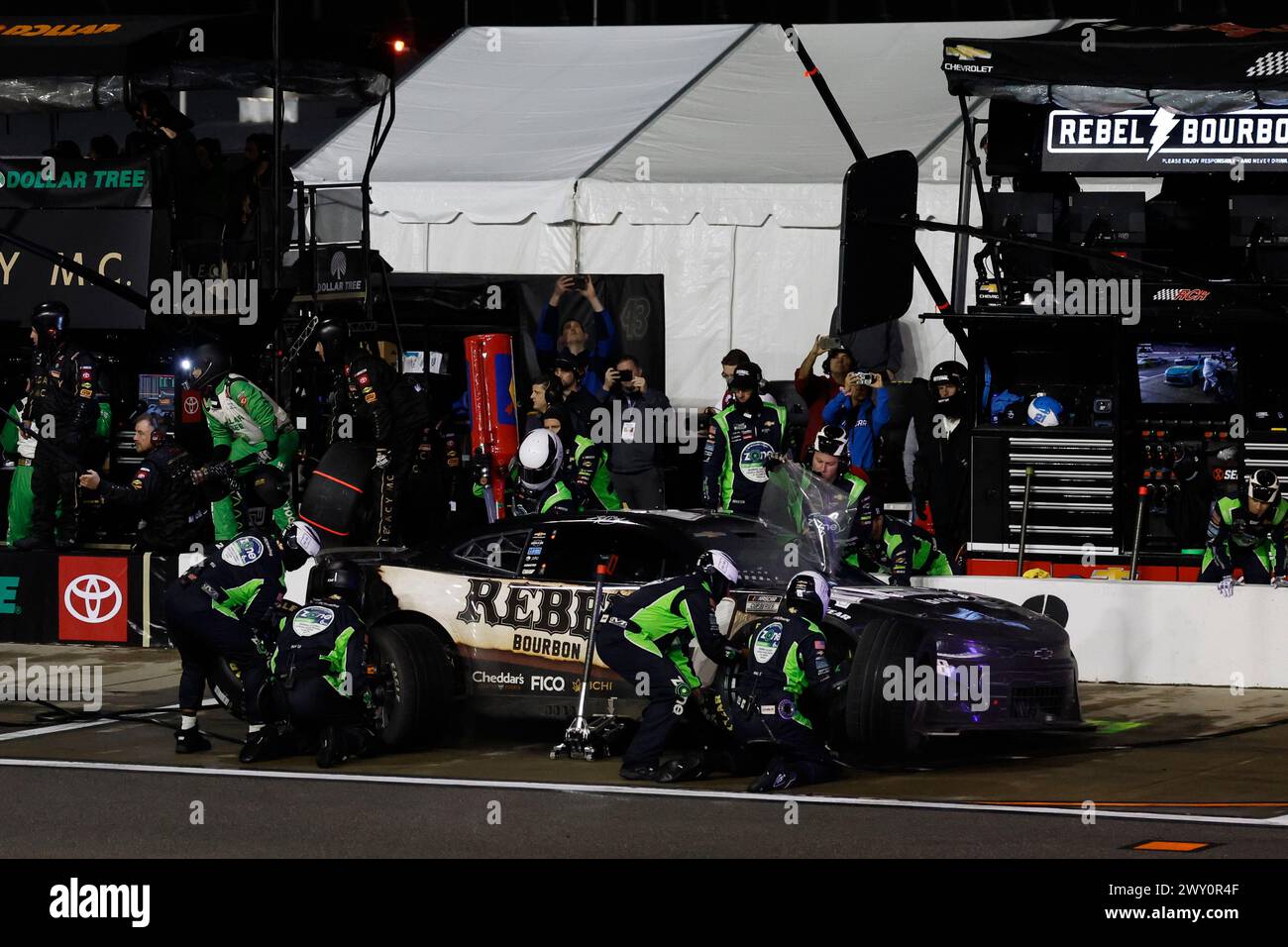 NASCAR Cup Series driver, Kyle Busch makes a pit stop for the Toyota ...
