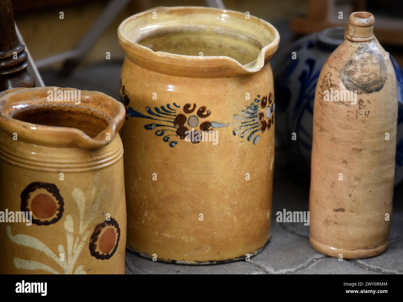Antique Alsatian glazed pottery pitchers with old farmhouse motifs on ...