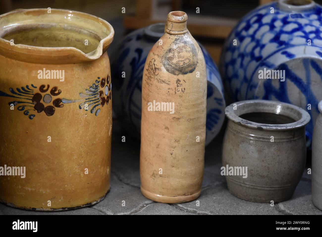 Antique Alsatian glazed pottery pitchers with old farmhouse motifs on ...