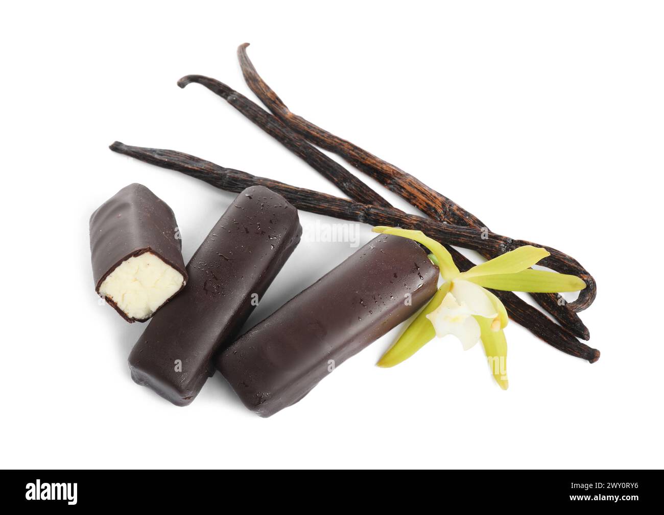 Glazed curd cheese bars, vanilla pods and flower isolated on white ...