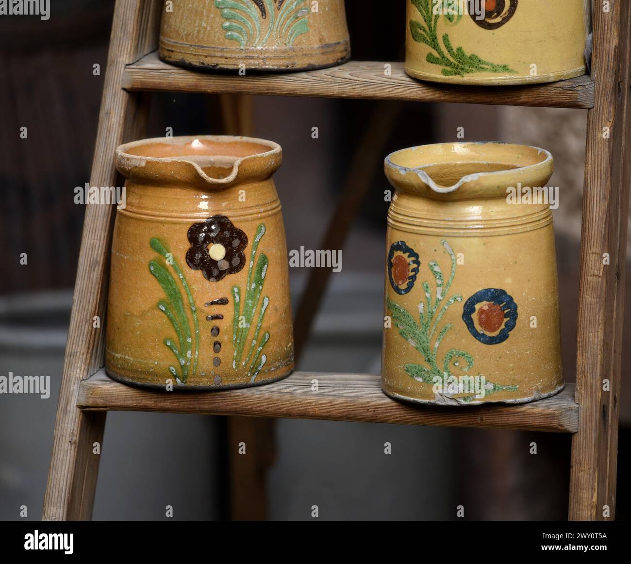 Antique Alsatian glazed pottery pitchers with old farmhouse motifs on ...