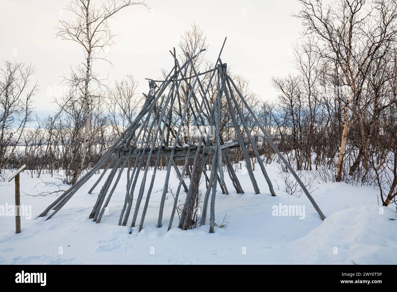 Skeleton of a Saami tent in a wintry landscape in Abisko National Park ...