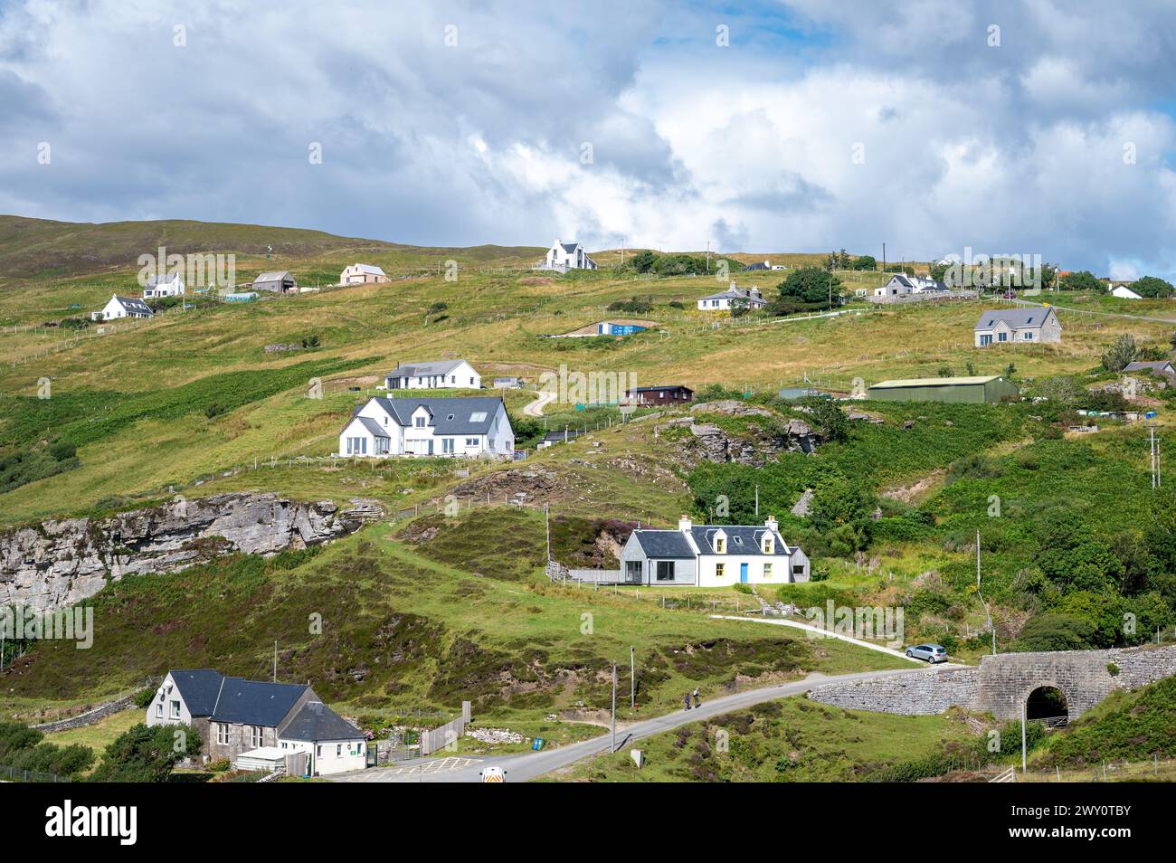 Houses and chalets at Elgol village over the Sea Loch, Isle of Skye ...