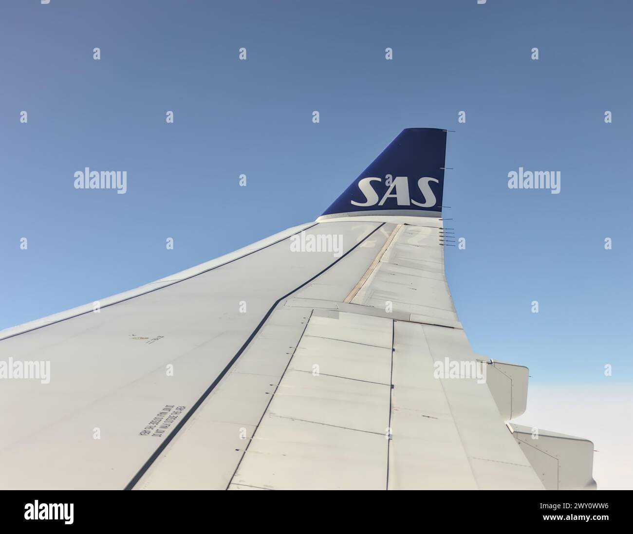 SAS airlines logo on the wing of a Scandinavian Airlines airplane ...