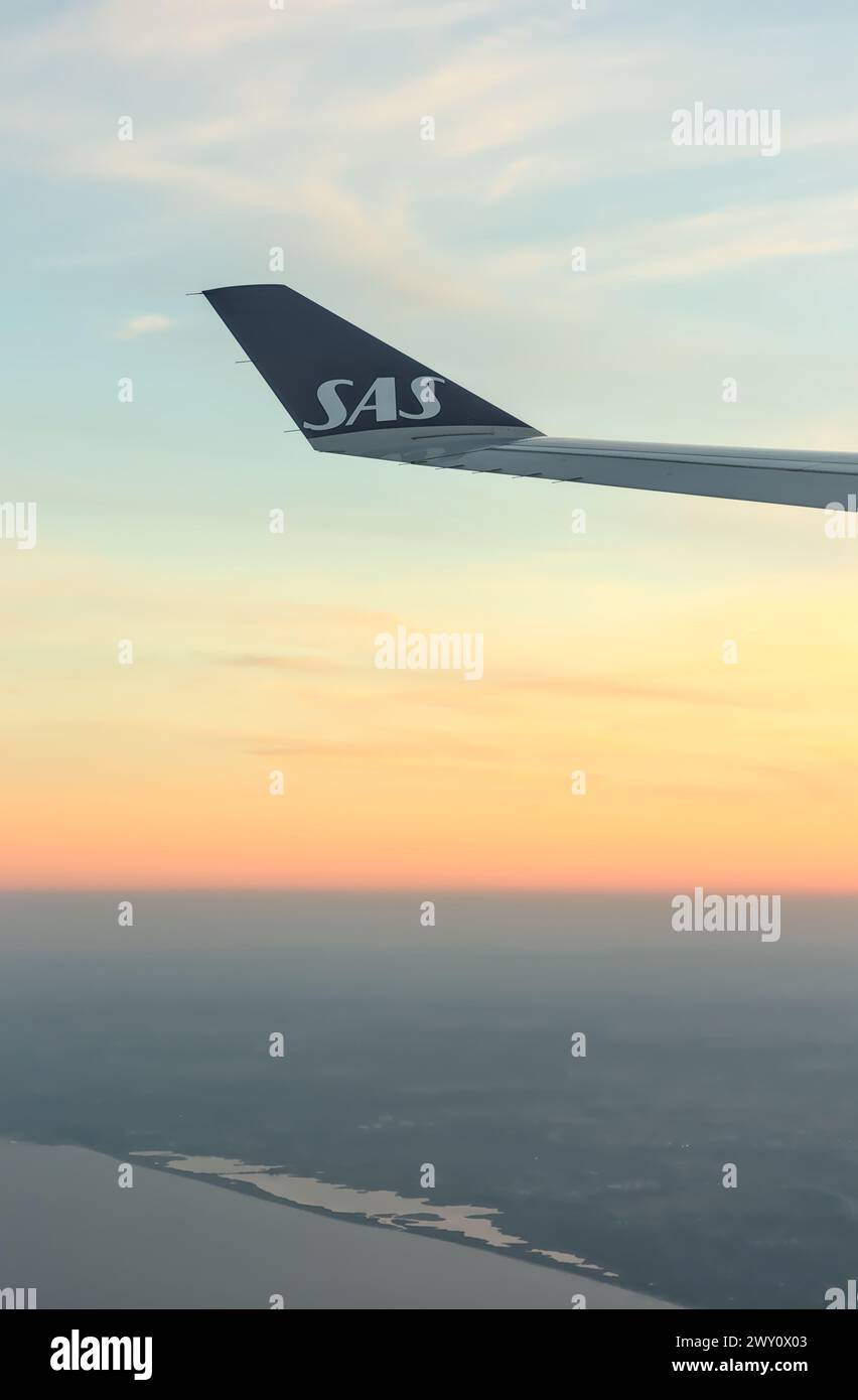 SAS airlines logo on the wing of a Scandinavian Airlines airplane ...