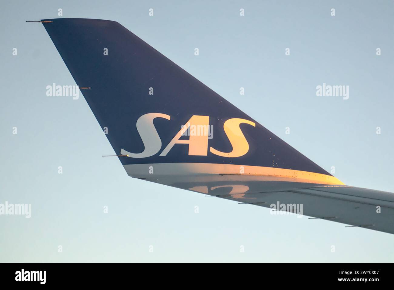 SAS airlines logo on the wing of a Scandinavian Airlines airplane ...