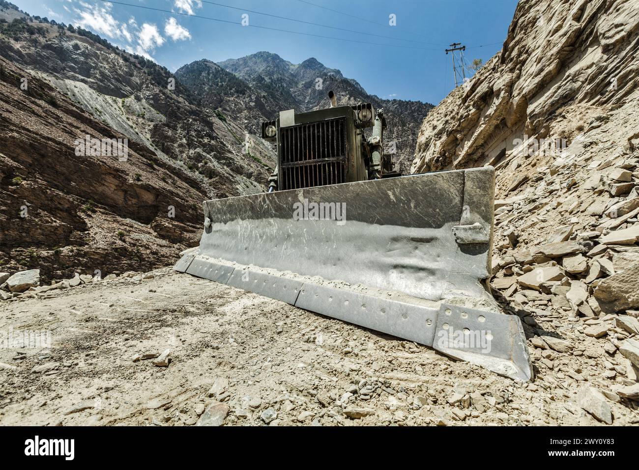 Bulldozer doing road construction in Himalayas Stock Photo - Alamy