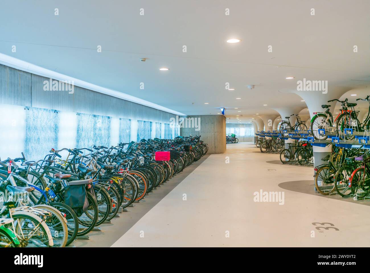 amsterdam, netherlands, 29 march 2024, underground bicycle garage under the railway stations ...