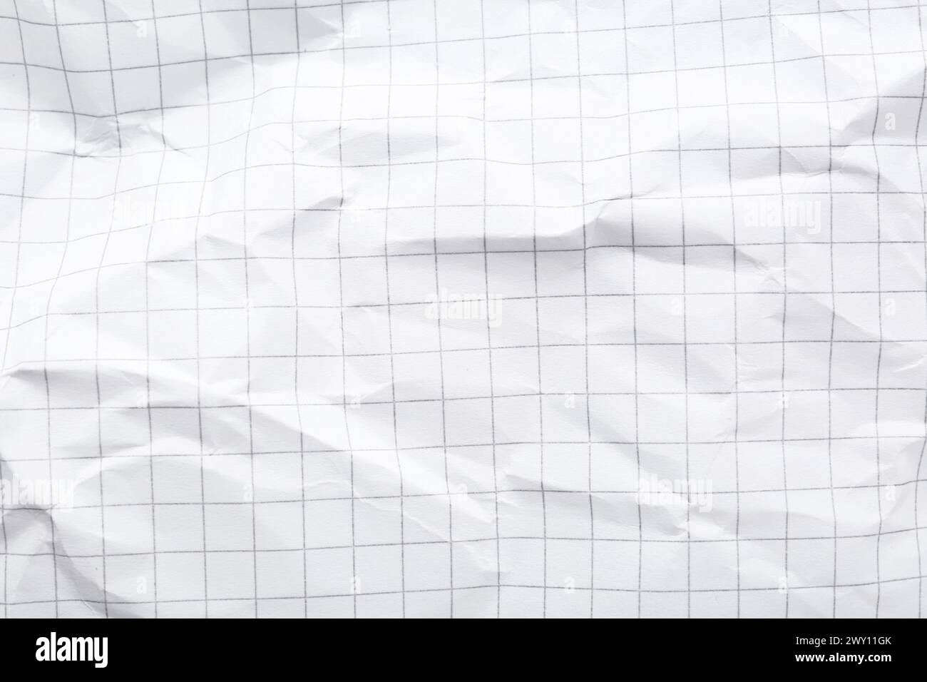 Crumpled checkered notebook sheet hi-res stock photography and images ...